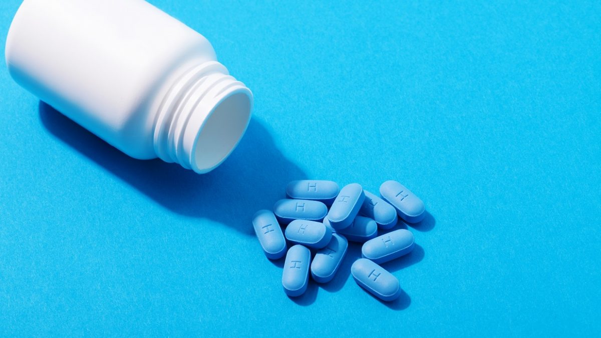 Open bottle of prescription PrEP Pills for Pre-Exposure Prophylaxis to ...